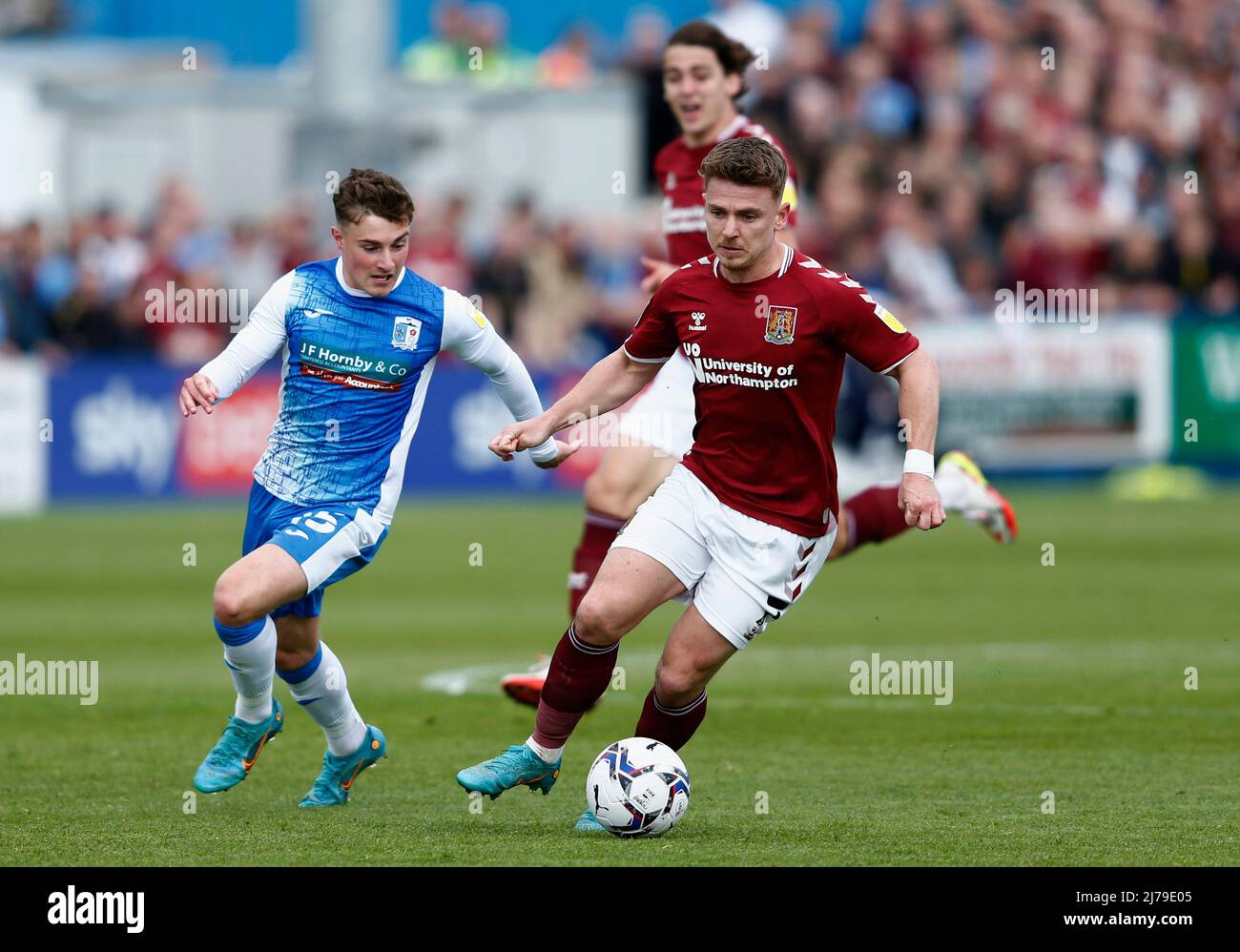 Barrow's Robbie Gotts (left) and Northampton Town's Sam Hoskins in ...