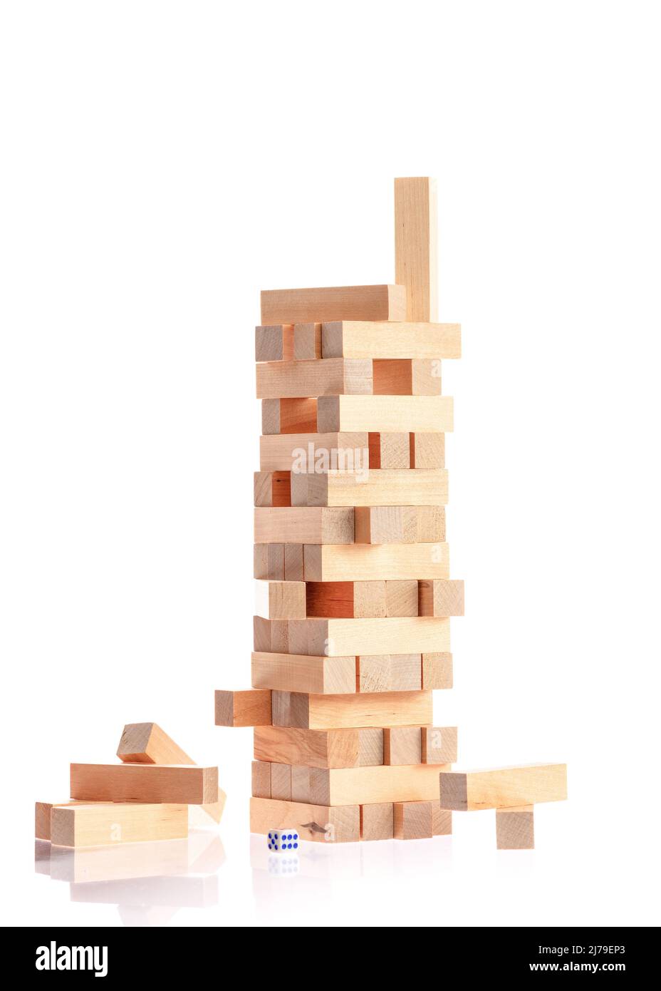 Board game made of wooden blocks. A tower of unevenly shifted wooden ...