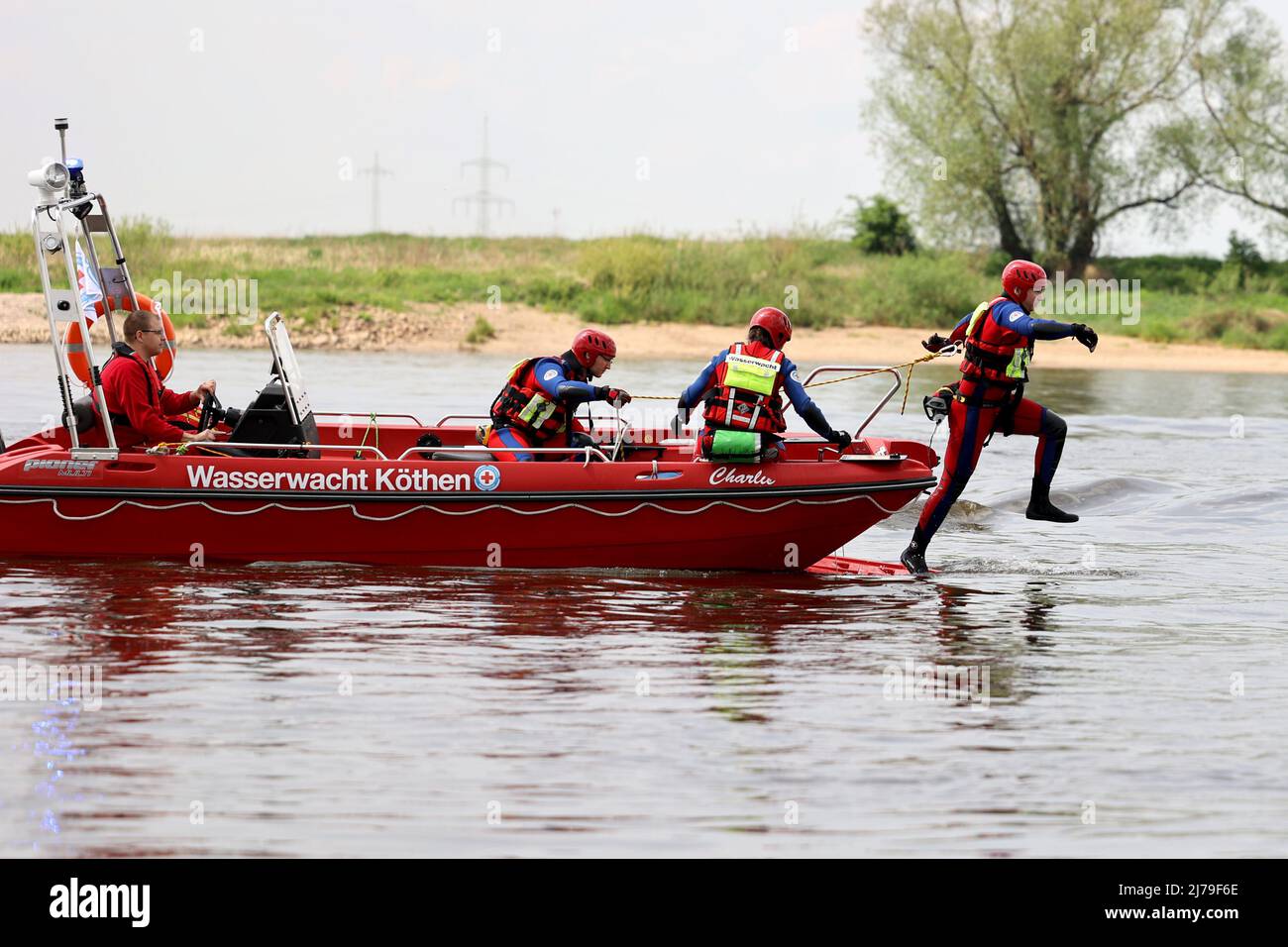 07 May 2022, Saxony-Anhalt, Niegripp: A lifeguard from Wasserwacht ...