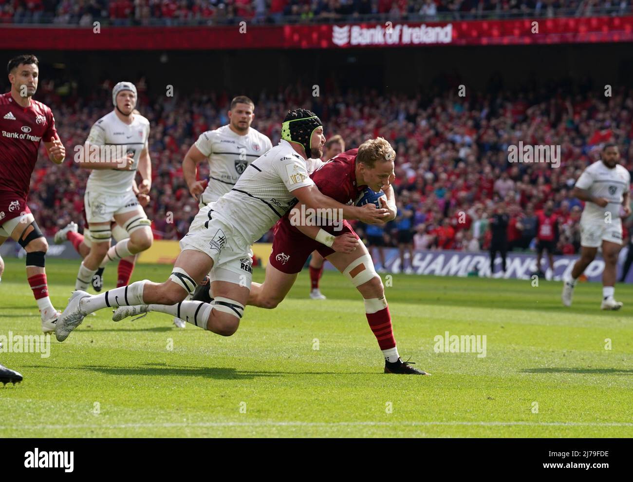 Munster's Mike Haley runs into score his sides third try during the ...