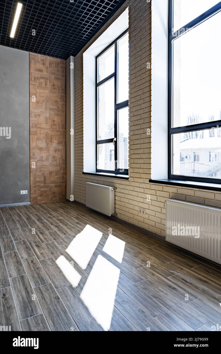 Empty open space office room with window Stock Photo - Alamy