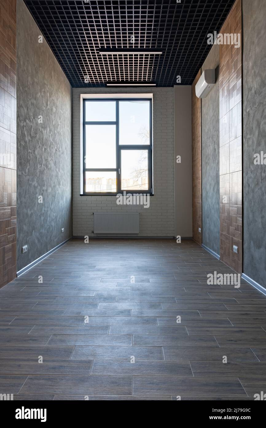Empty open space office room with window Stock Photo - Alamy