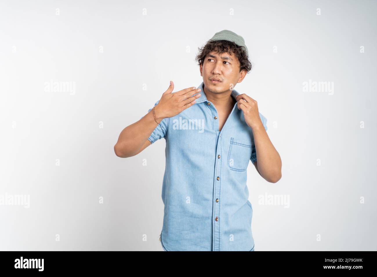 young asian man feeling the hot weather. hot weather Stock Photo - Alamy