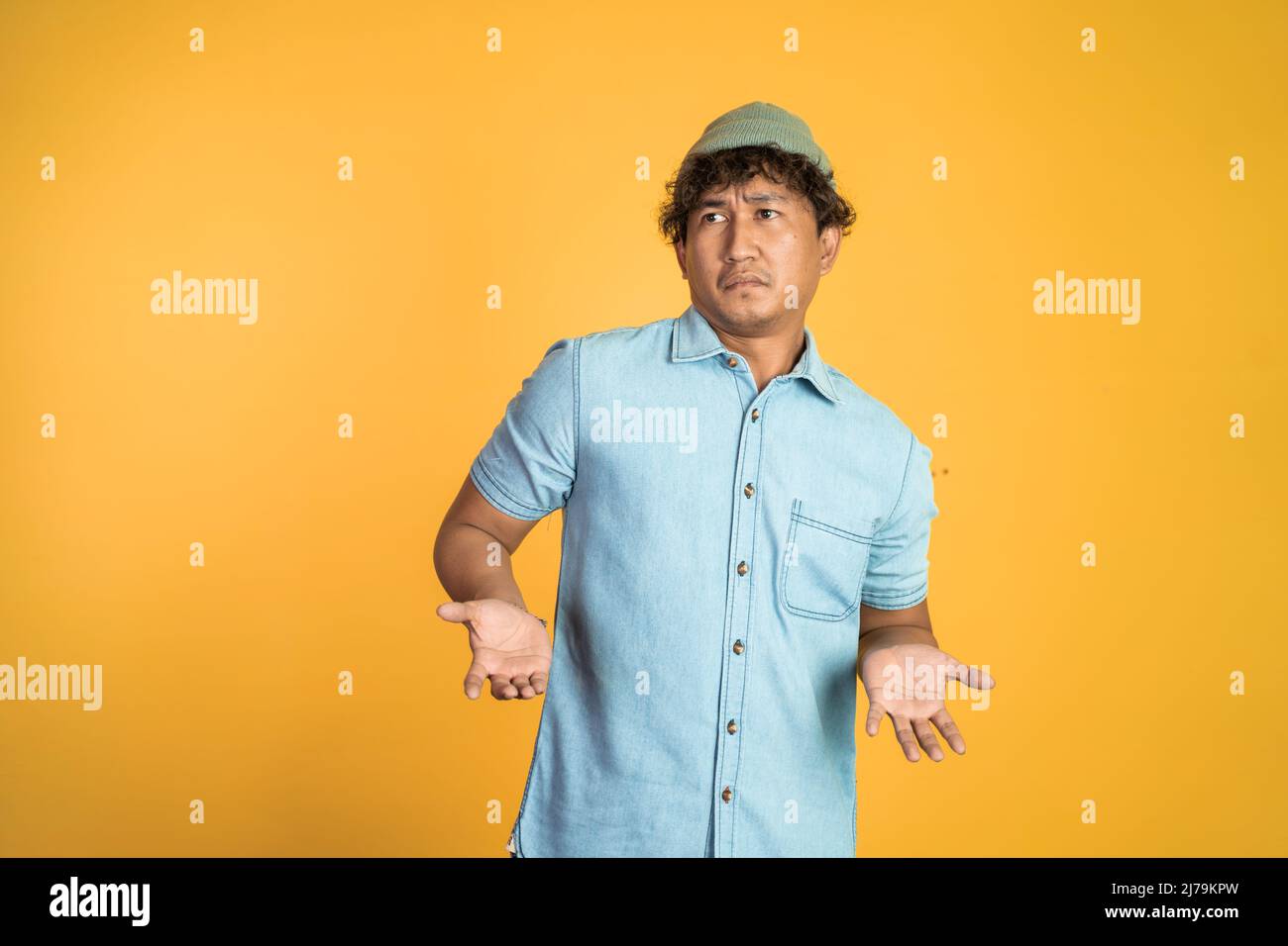 Young man questioning expression on hi-res stock photography and images ...