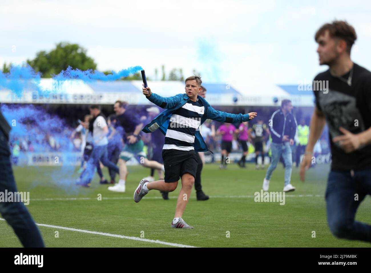 Fans invade the pitch after Bristol Rovers make the score 7-0 during ...