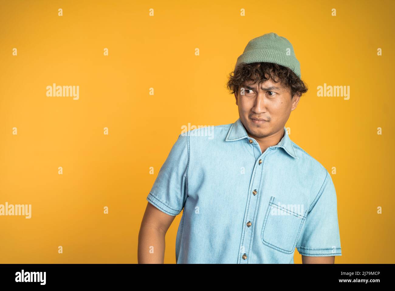 man with disgusting expression isolated over white background Stock ...