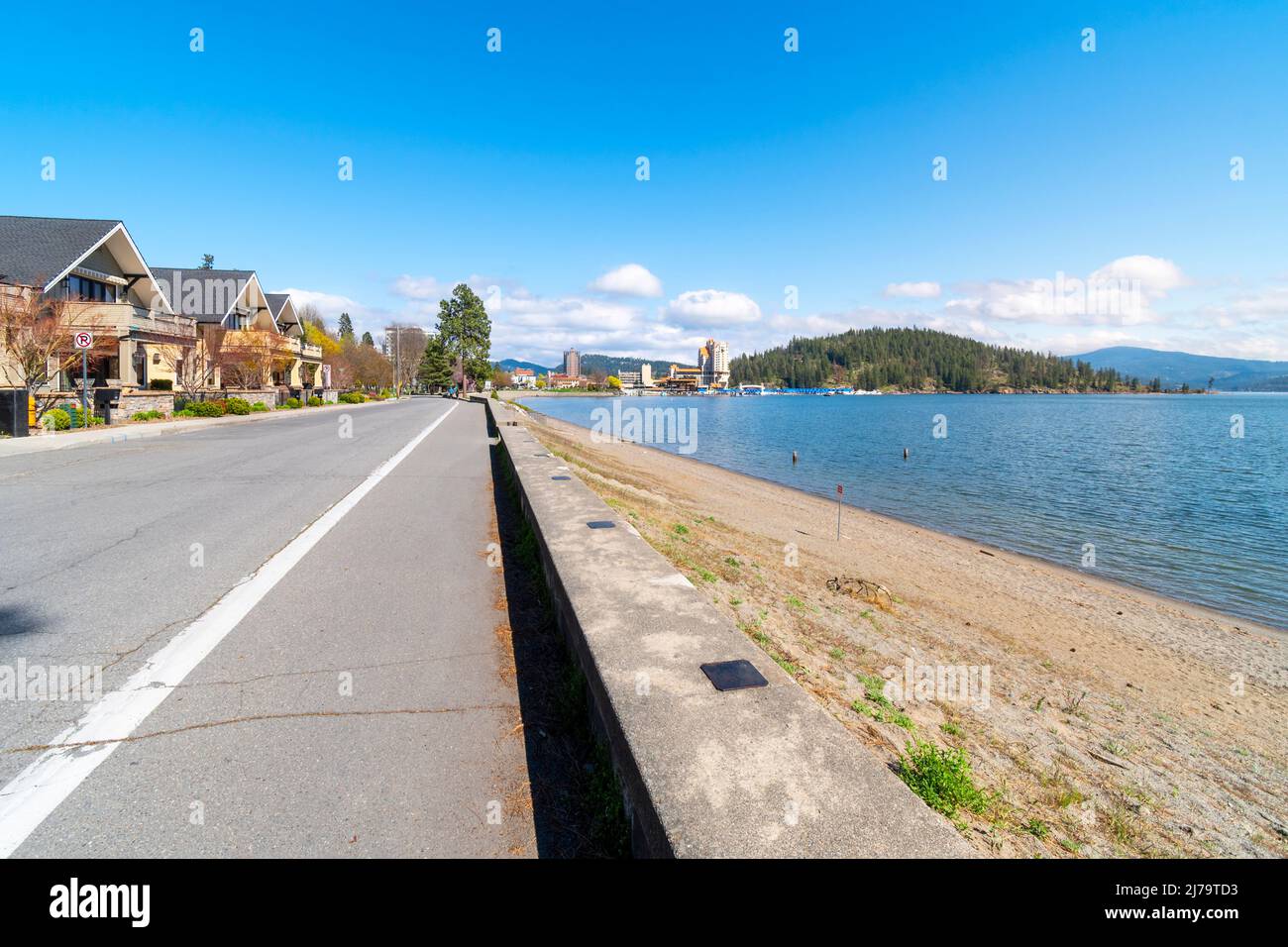 Luxury waterfront homes face the lake with the city beach, park and ...