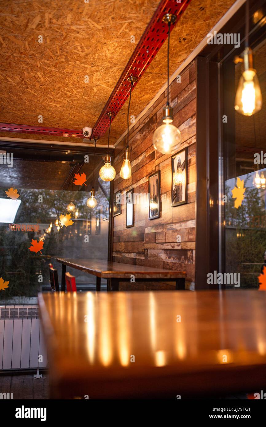 Light bulbs glow in restaurant hi-res stock photography and images - Alamy