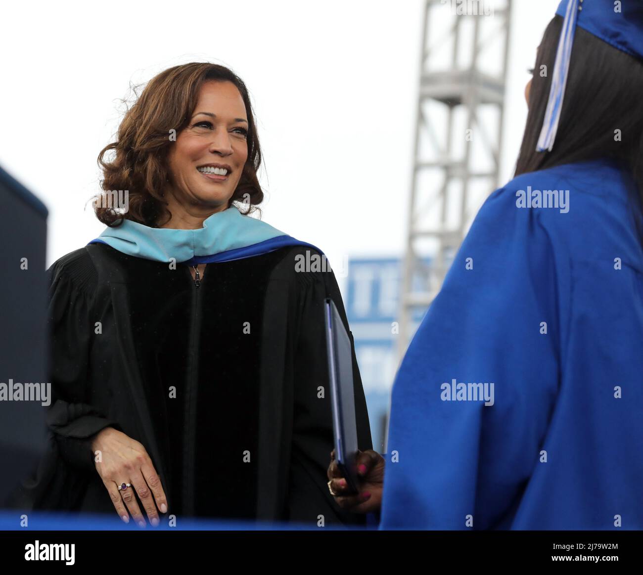 Vice President Kamala Harris congratulates graduates as they cross the ...