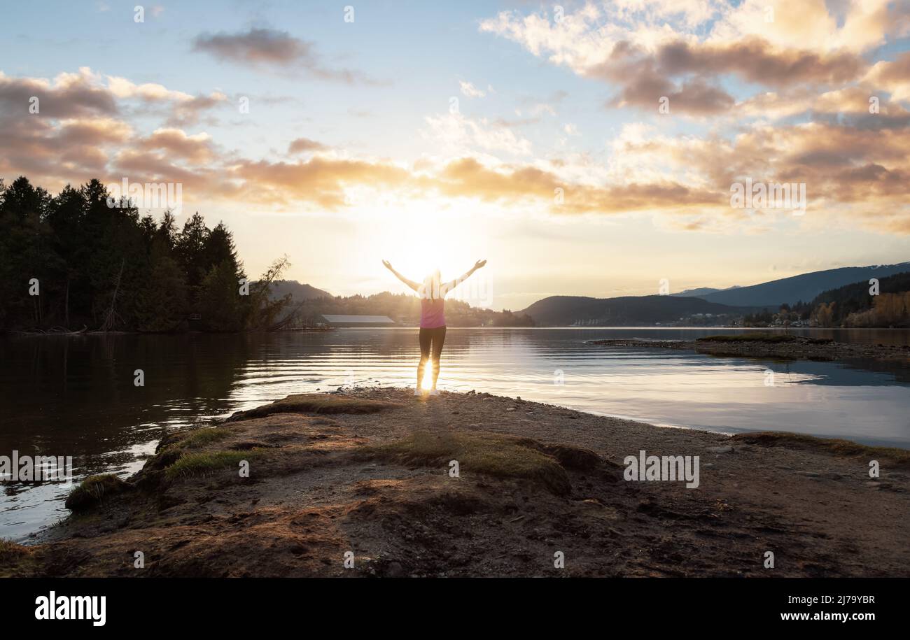 Adventurous Woman on a shore Stock Photo - Alamy