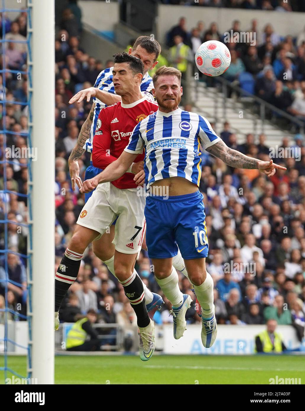 Manchester United's Cristiano Ronaldo (centre) battles with Brighton and Hove Albion's Lewis ...