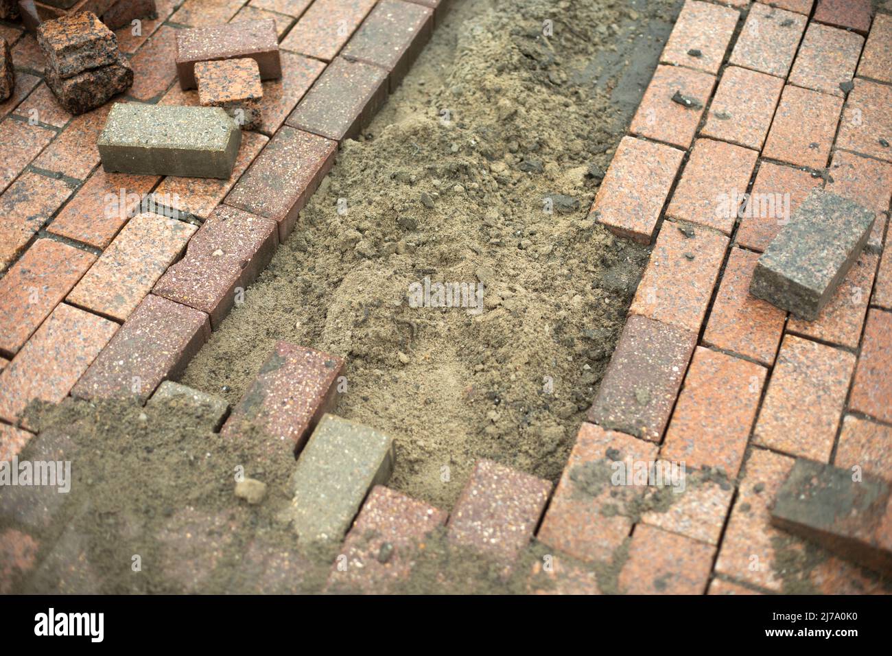Repair of road. Creation of paving stones. Details of construction of ...