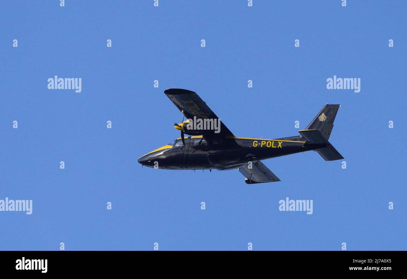 A Police plane flies overhead before the Premier League match at ...