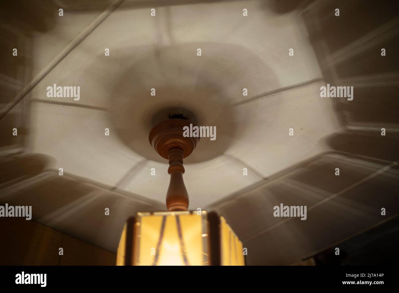 Light lamp on ceiling. Shadow from lamp in room. Light source Stock ...