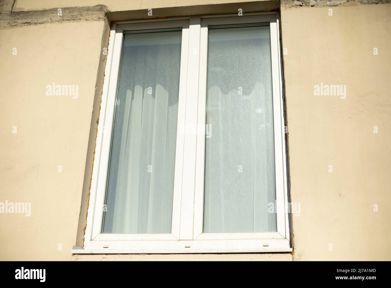 Window in building. Plastic window outside. Details of residential ...