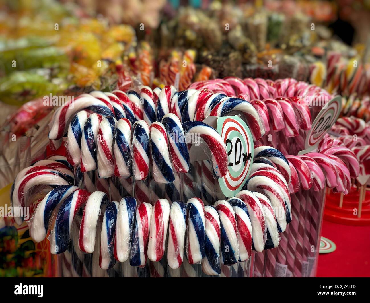 colorful stick candies on shelf in a noel market Stock Photo - Alamy