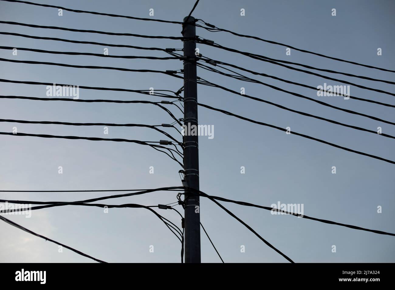 Wires against sky. Lots of electrical wires. Electric transmission ...