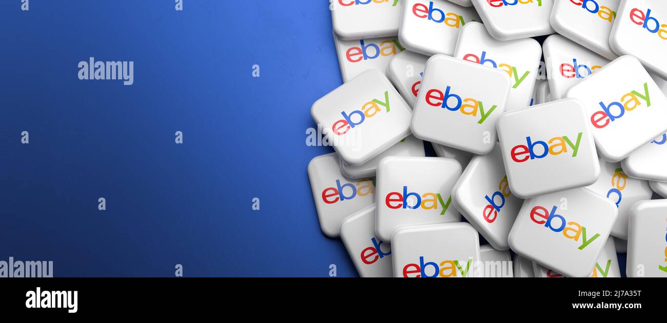 Logos of the ecommerce and auctioning company ebay on a heap on a table ...