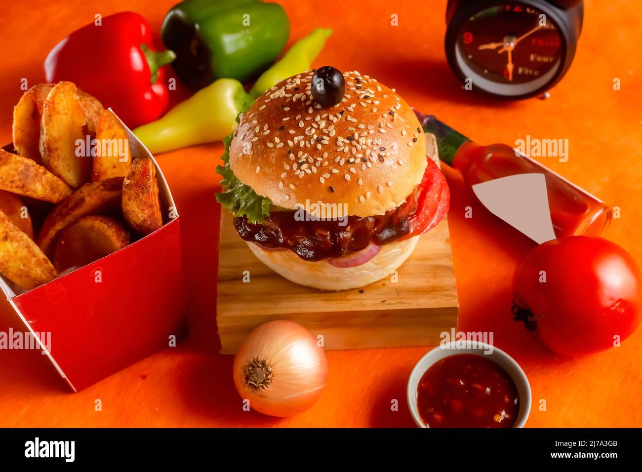 BBQ chicken cheese burger with french fries, potato and tomato slice ...