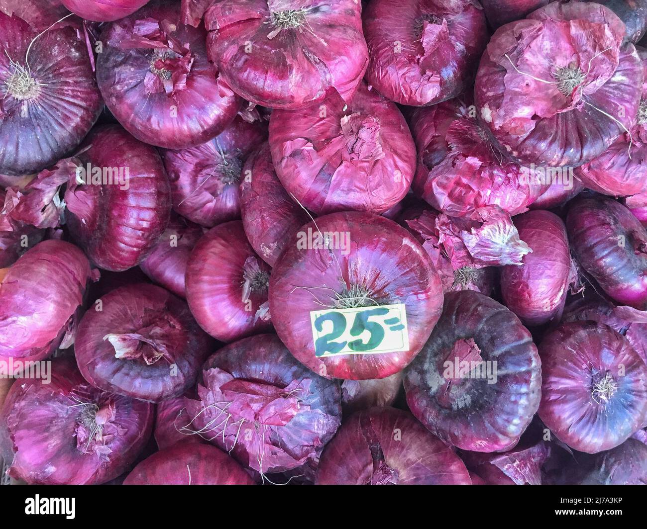 pile of onions with price label Stock Photo - Alamy