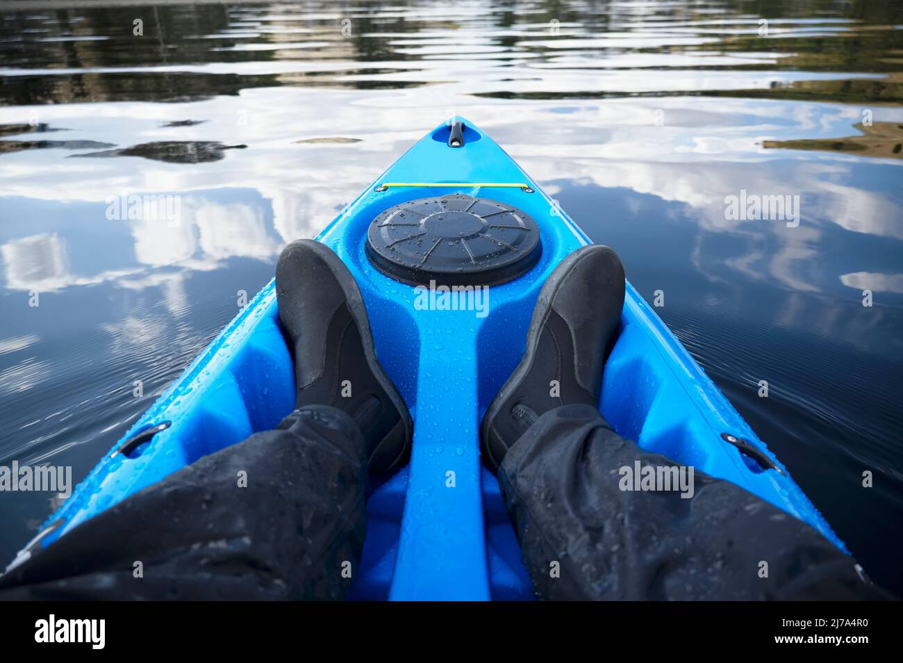 Blue kayak on open water at Loch Lomond Stock Photo - Alamy
