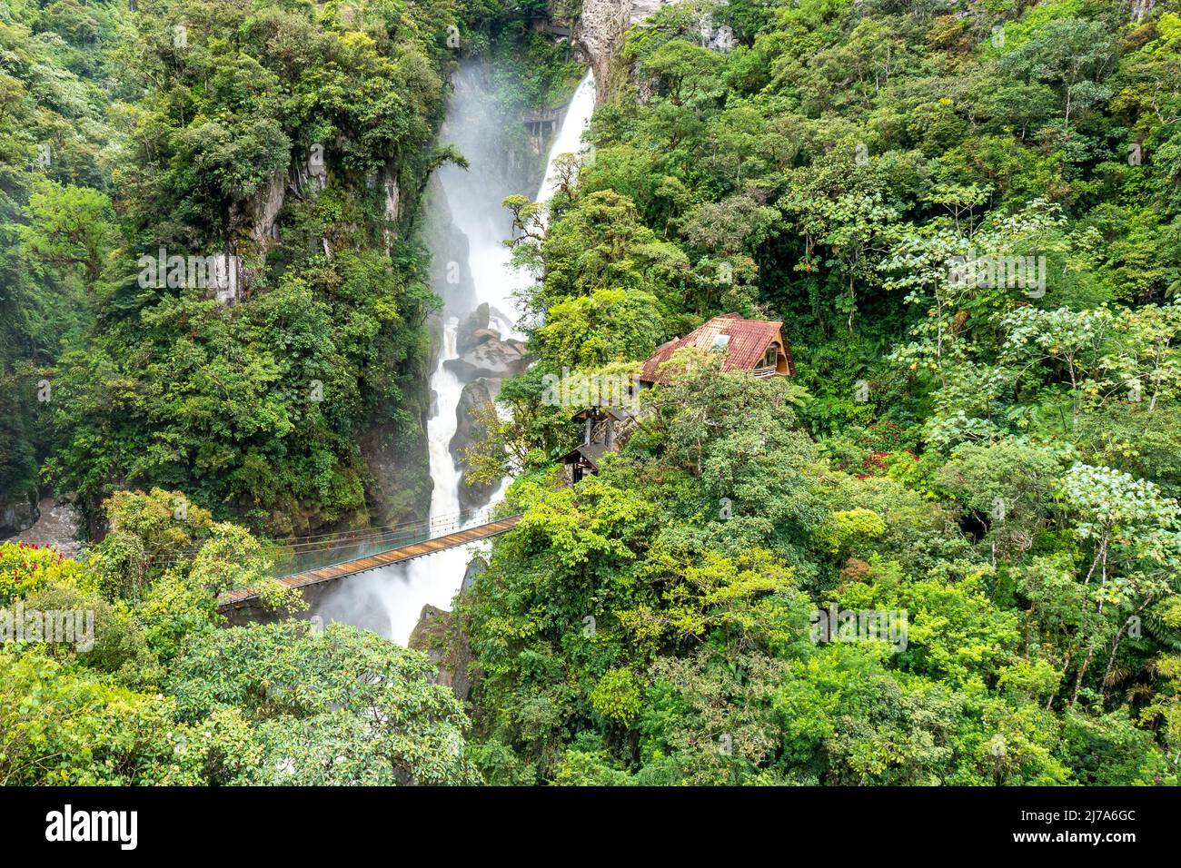 El Pailon del Diablo waterfall cascade and suspended bridge. Aerial ...