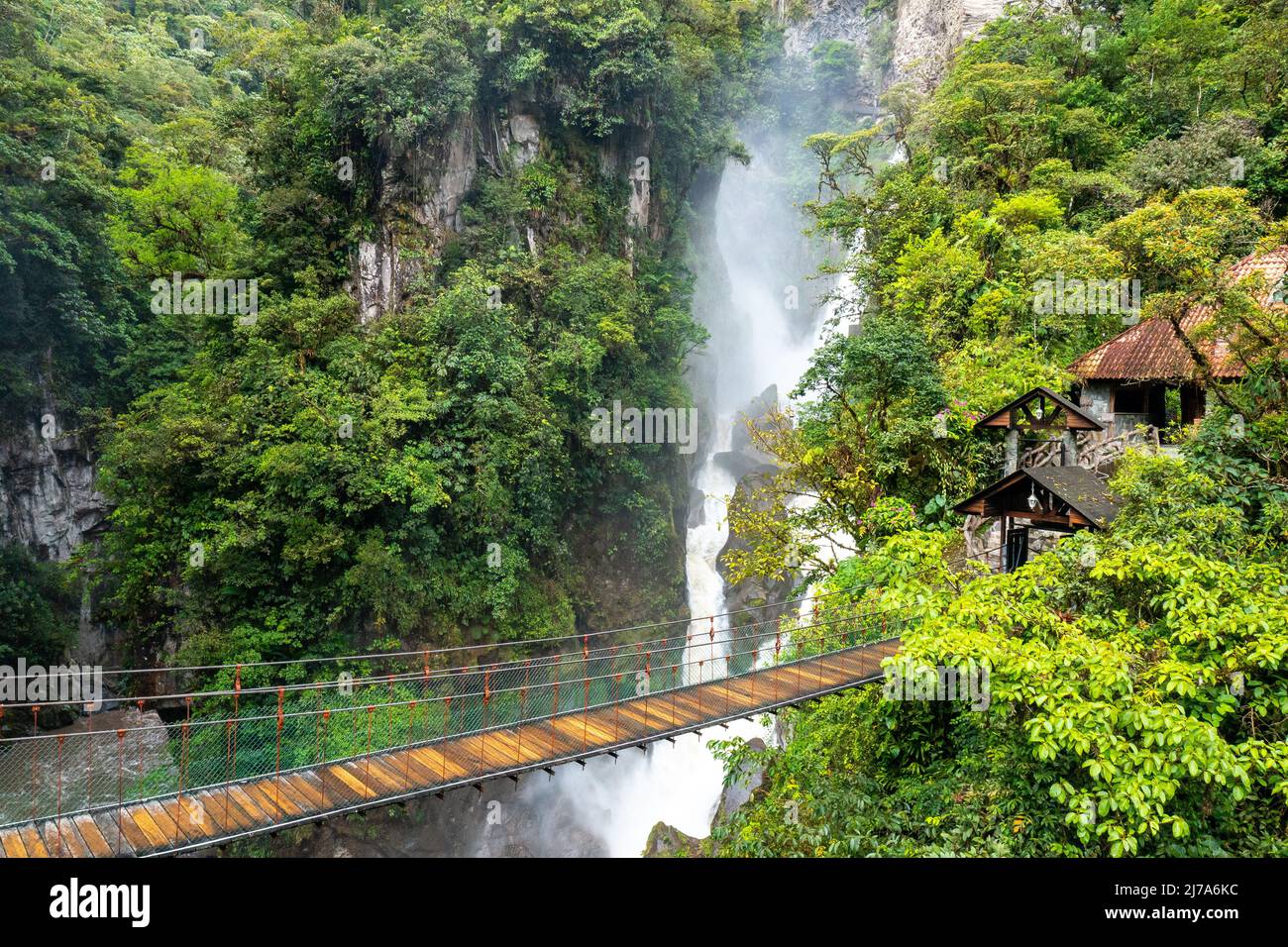 El Pailon del Diablo waterfall cascade and suspended bridge. Aerial ...