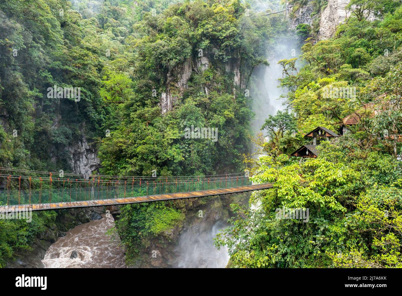 El Pailon del Diablo waterfall cascade and suspended bridge. Aerial ...