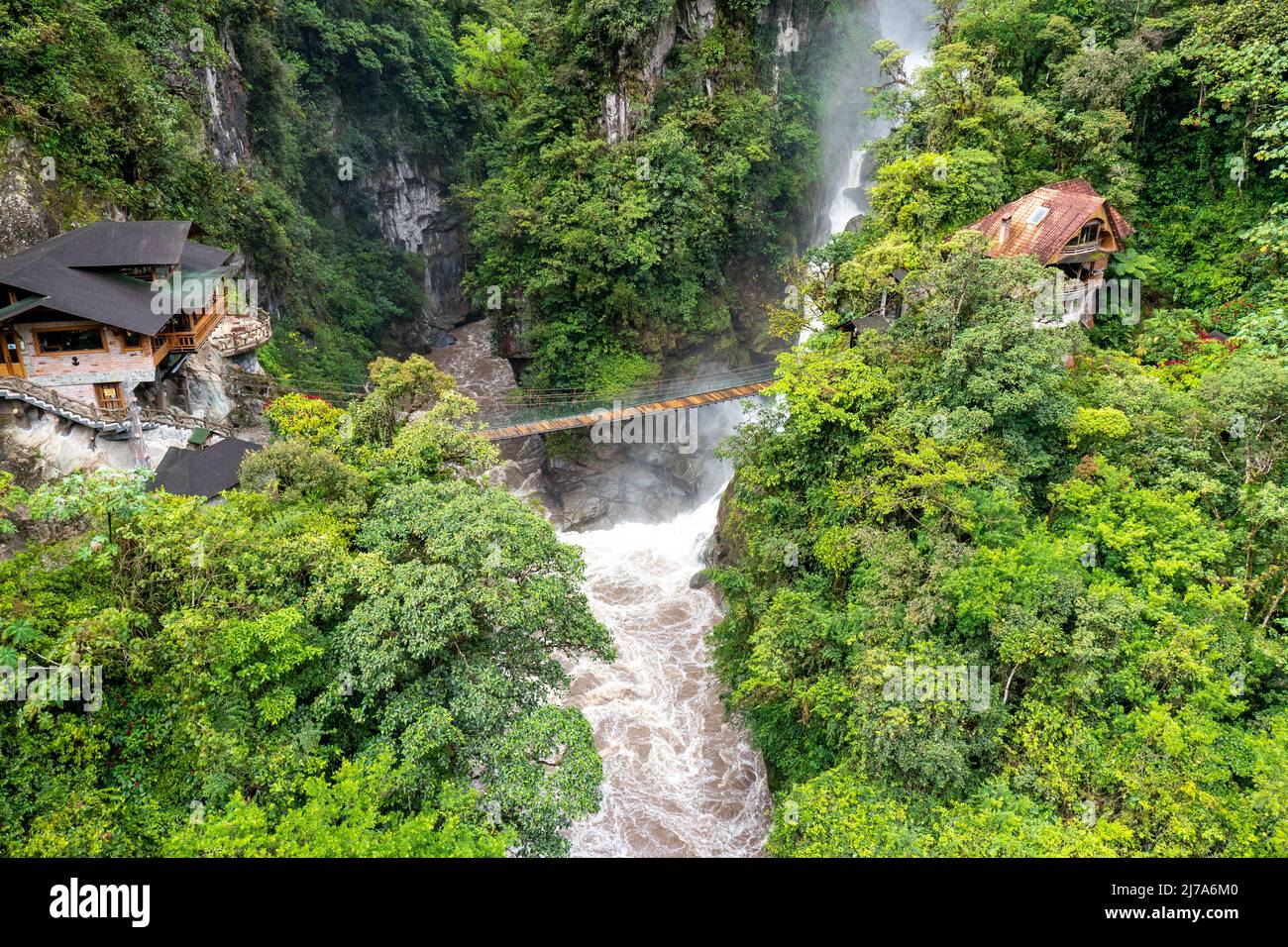 El Pailon del Diablo waterfall cascade and suspended bridge. Aerial ...