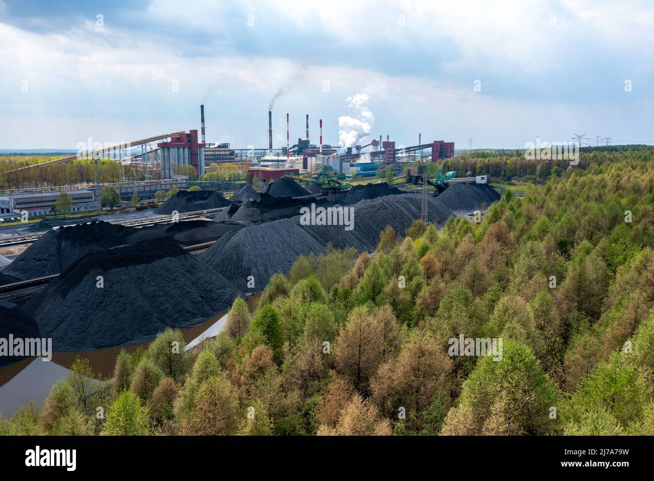Black coal deposits. Exploration and machine. View from above Stock ...
