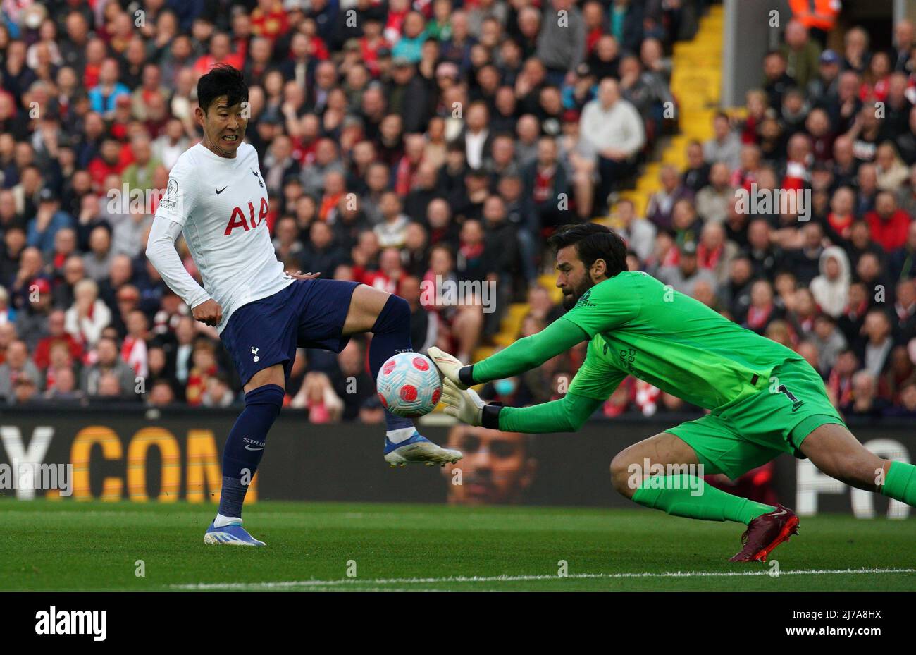 Liverpool goalkeeper Alisson saves from Tottenham Hotspur's Son Heung ...