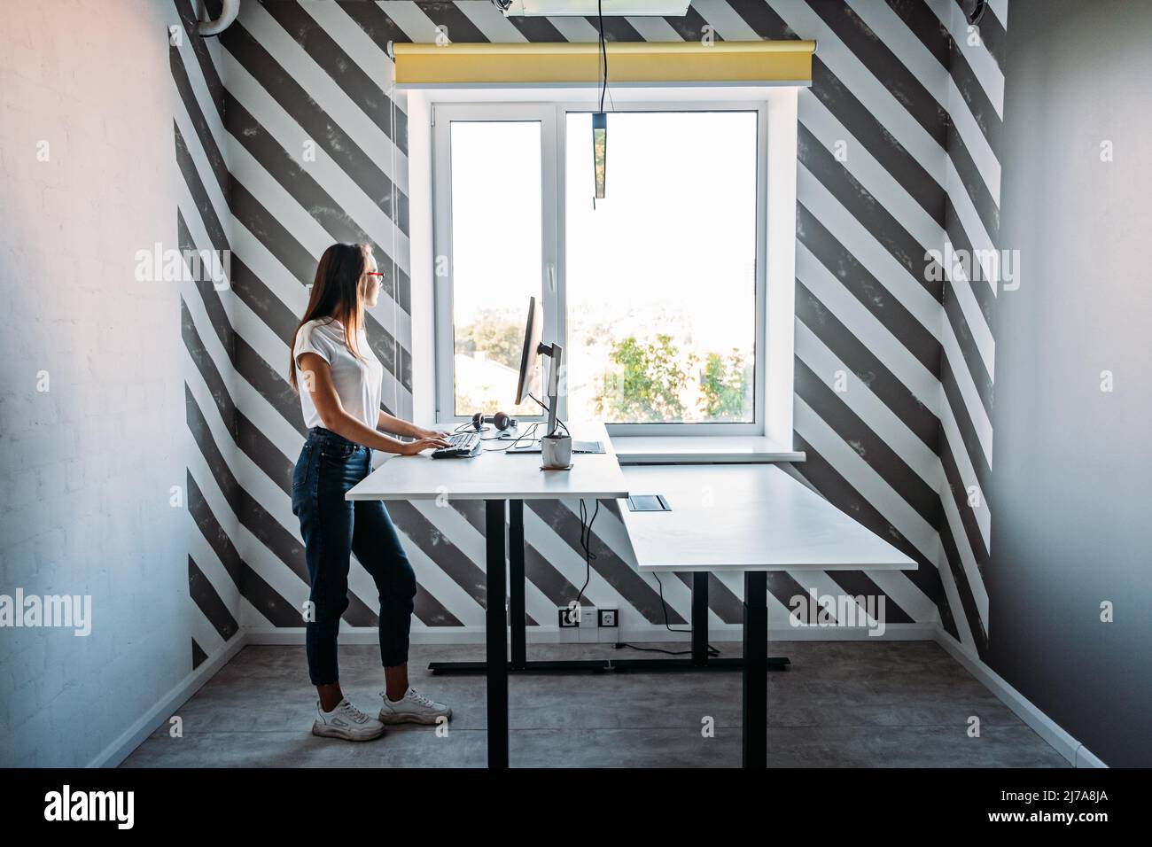 Woman standing comfortable home hi-res stock photography and images - Alamy