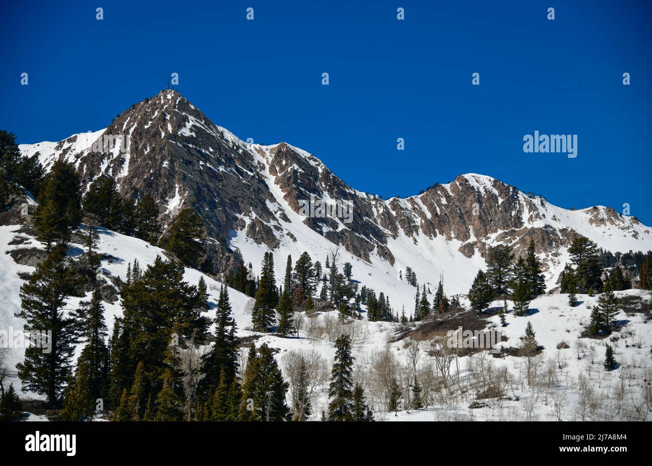 Beautiful landscape at Snowbasin Ski Resort, Utah. Snow slopes, rocky ...