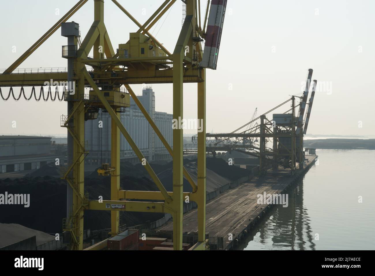Empty pier of coal terminal in port of Venezia, Italy with some cargo ...