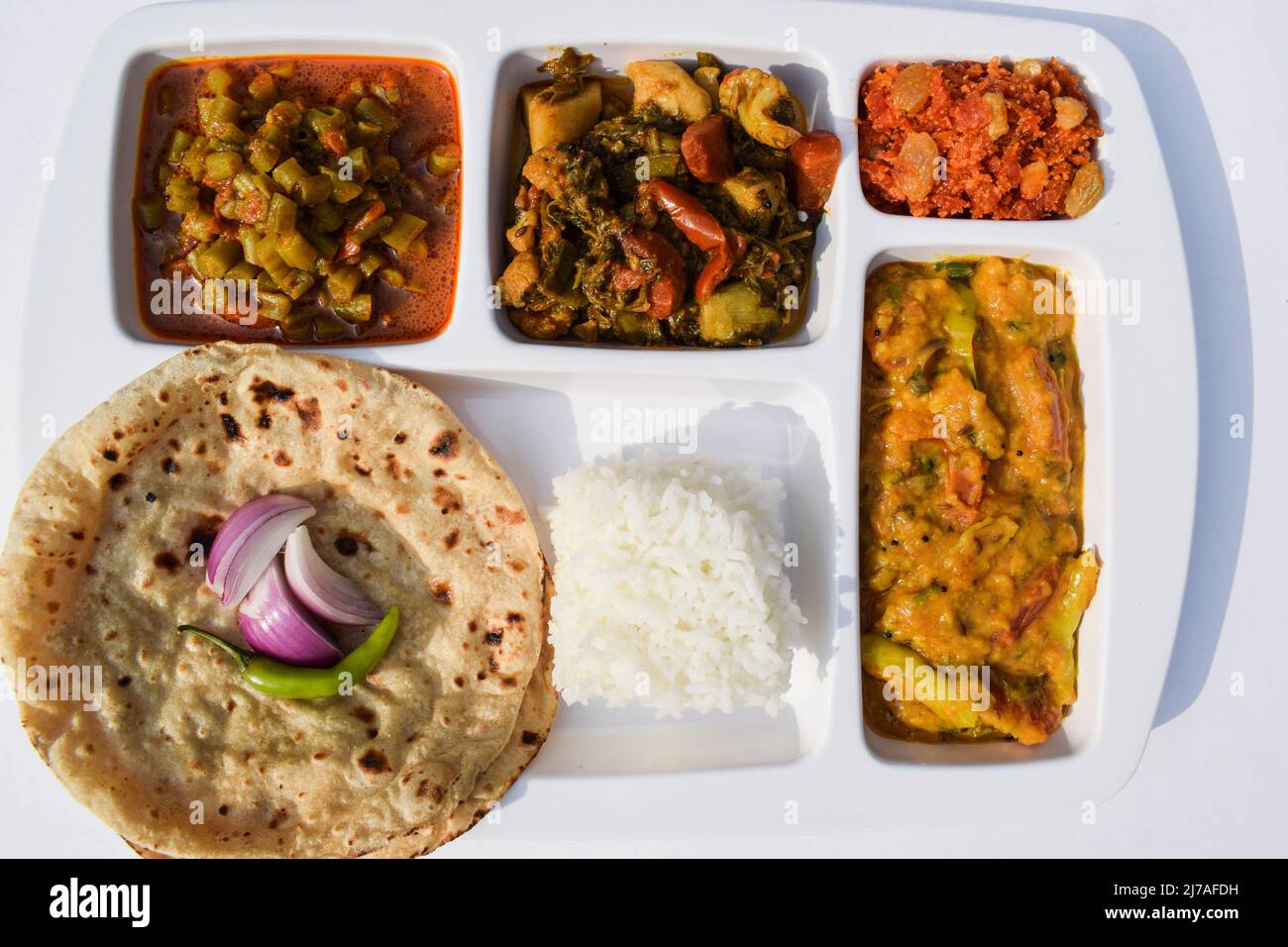 Indian Simple homemade lunch of Roti, sabji with mix veg brinjal potato ...