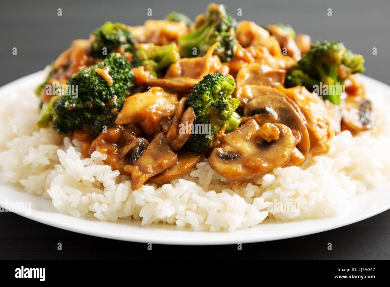 Homemade Chicken Veggie Stir Fry with White Rice, side view. Close-up ...