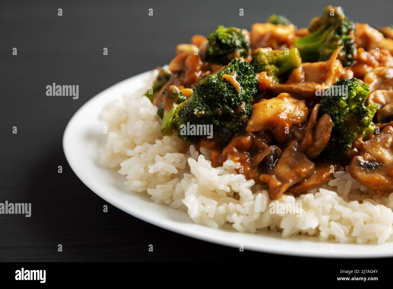 Homemade Chicken Veggie Stir Fry with White Rice, side view. Close-up ...