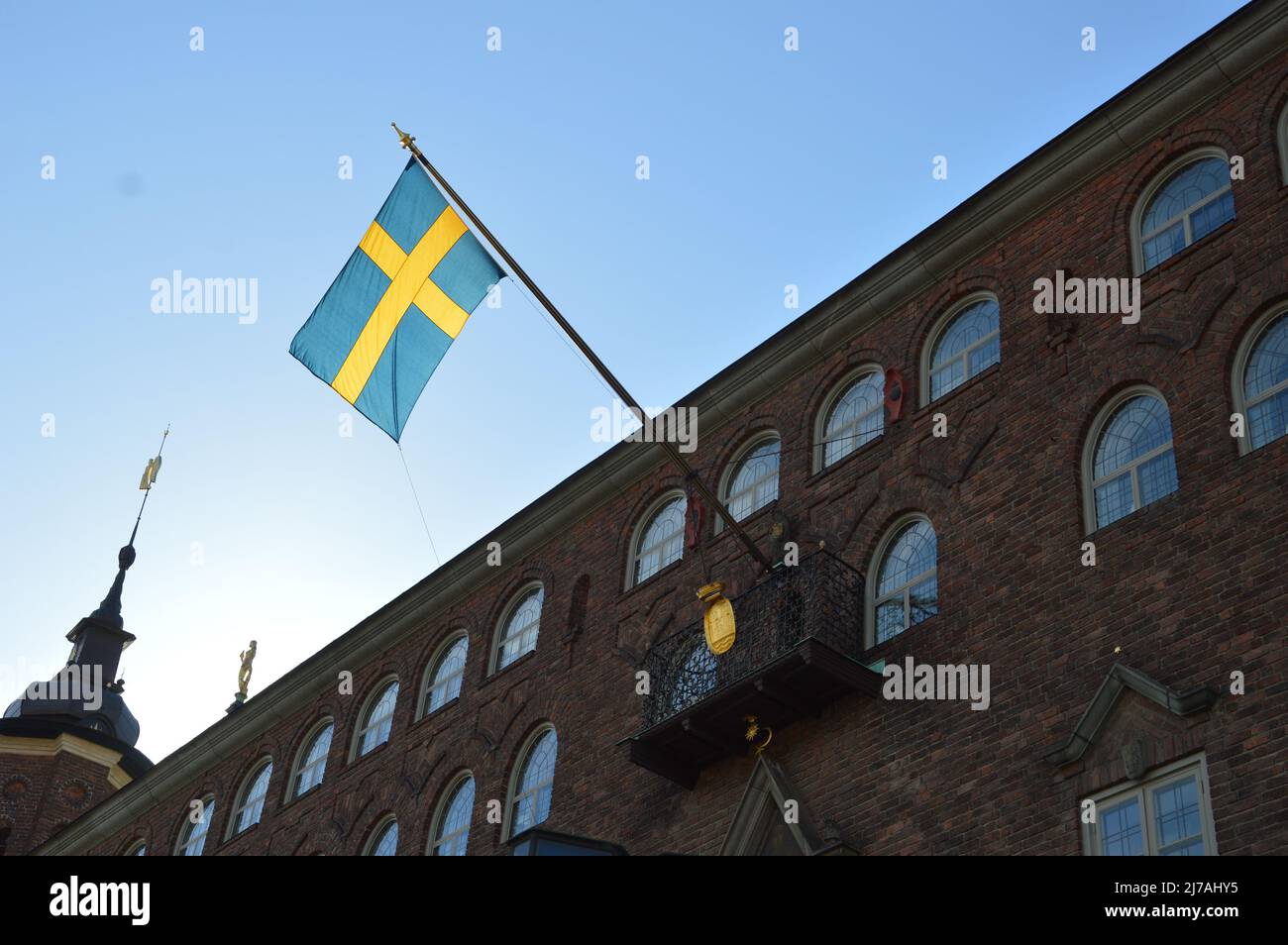 Swedish flag - Stockholm City Hall - April 2022 Stock Photo - Alamy