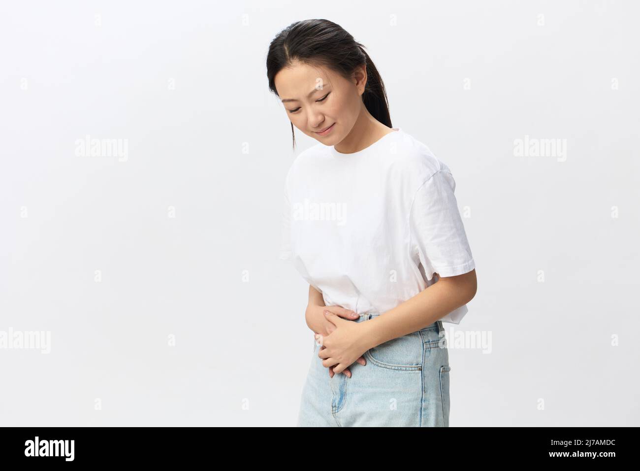 Unhappy young female patient abdominal hi-res stock photography and ...