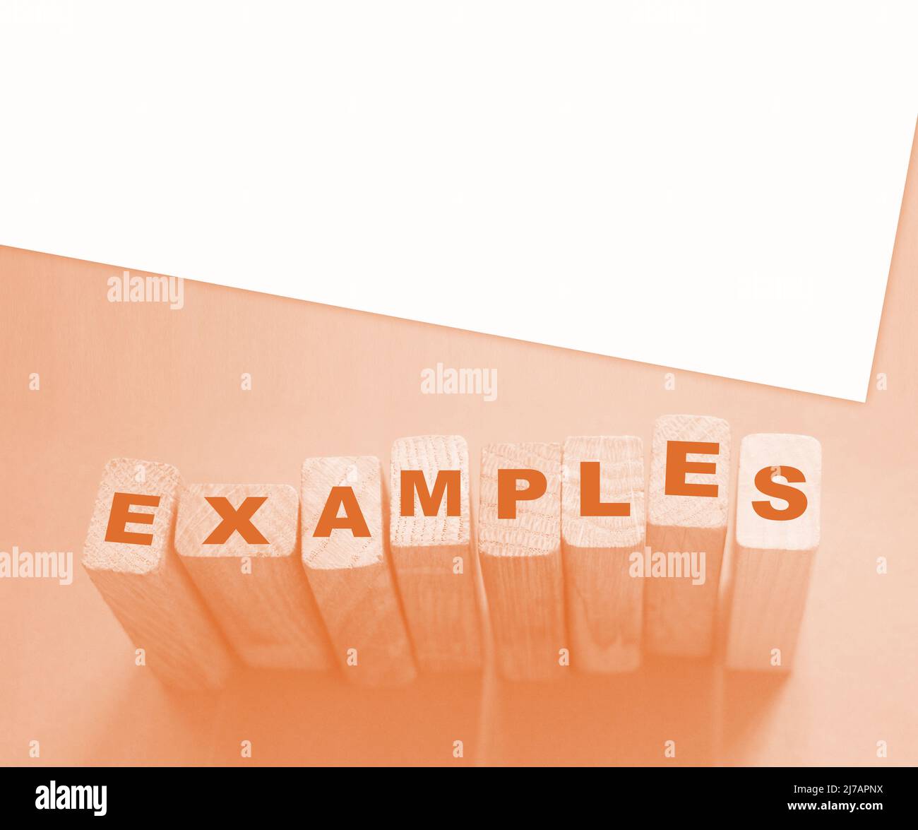 Examples word written on wooden blocks. Education or storytelling ...
