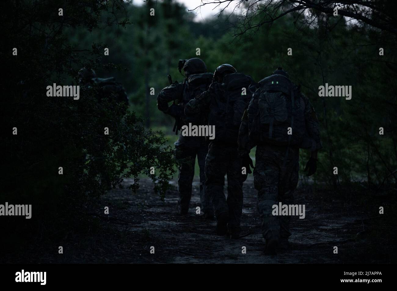 U.S. Army Special Forces members embark on a night-time training ...