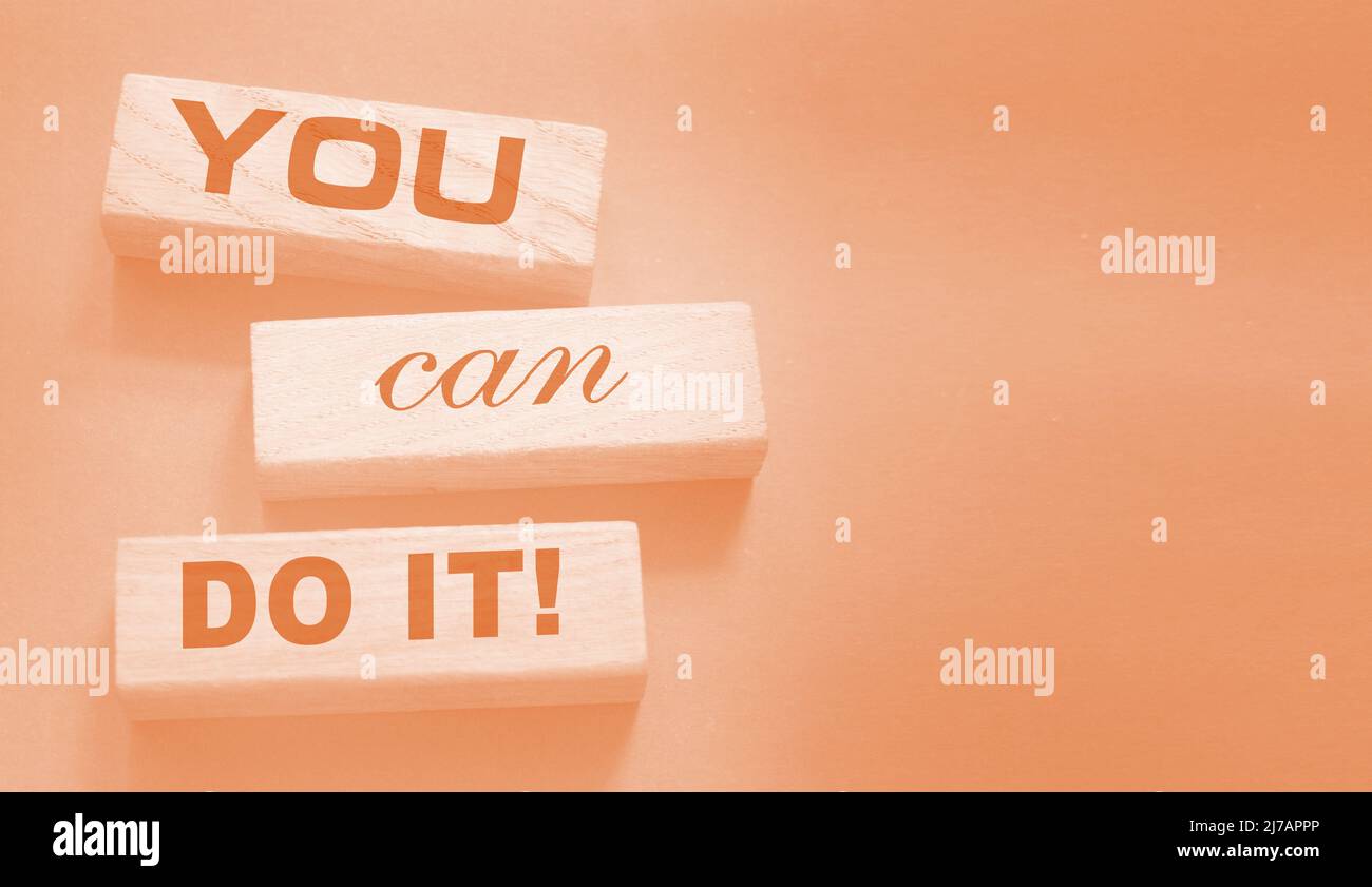 YOU CAN DO IT word on wooden blocks on gray background. Motivation ...