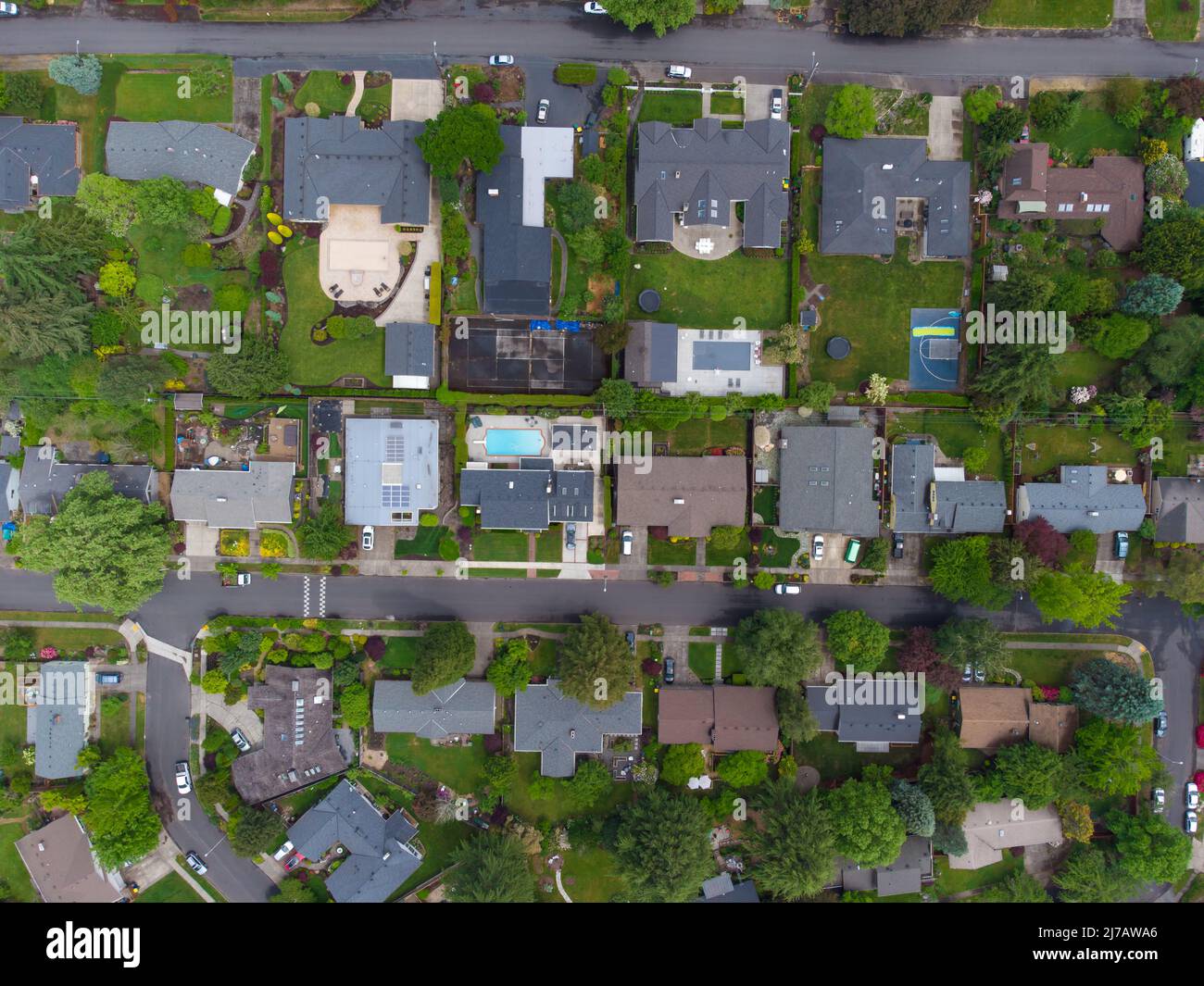 Shooting from the air. Small town, suburb. Roofs of small houses. Lots ...