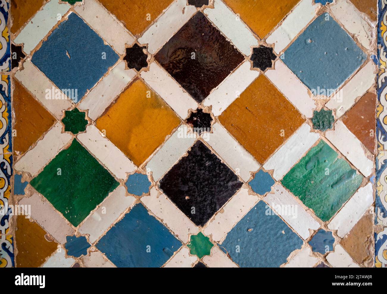 Ornamental medieval ceramic tiles of walls in Nasrid Palaces in the ...