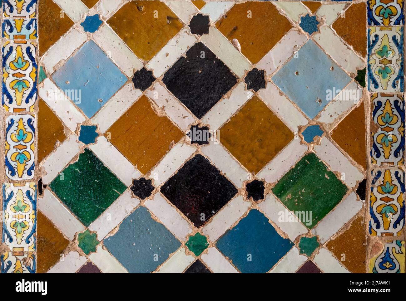 Ornamental medieval ceramic tiles of walls in Nasrid Palaces in the ...