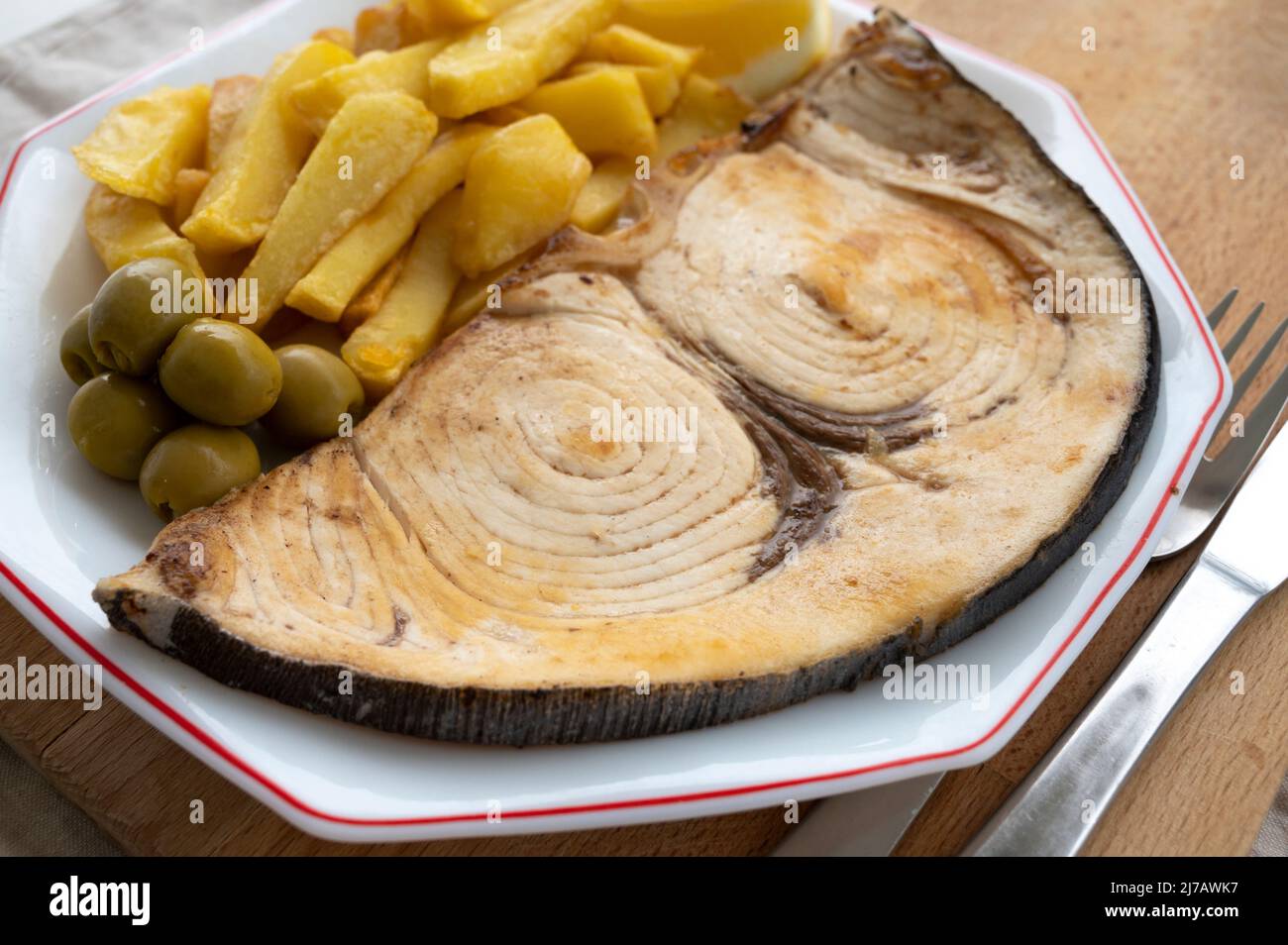 Seafood dish, grilled steak from swordfish or spada served with french ...