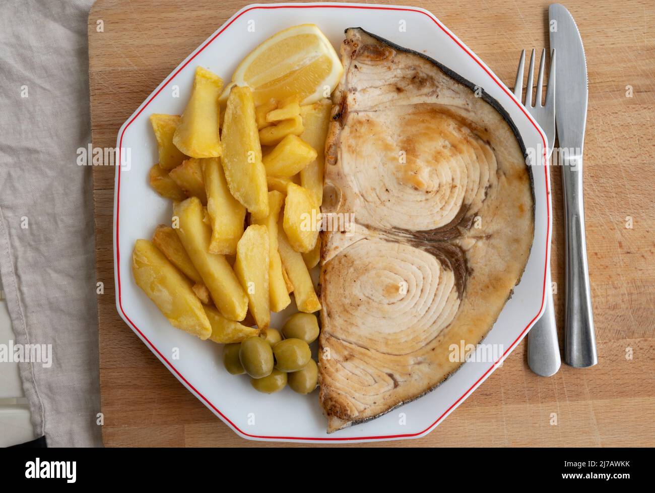 Seafood dish, grilled steak from swordfish or spada served with french ...