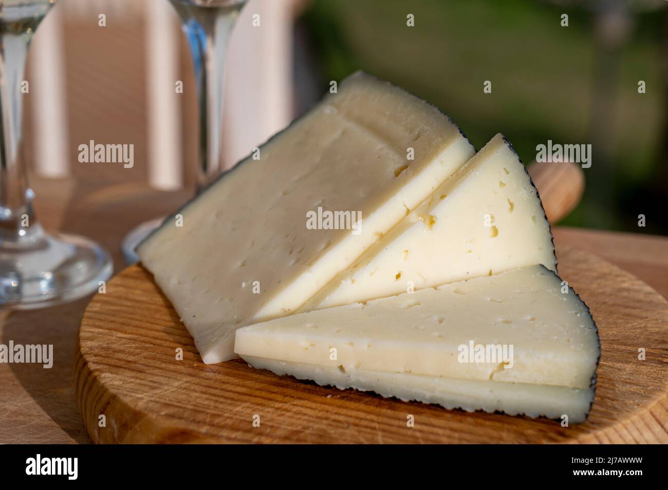Spanish hard manchego, cow, sheep and goat cheese served outdoor in ...
