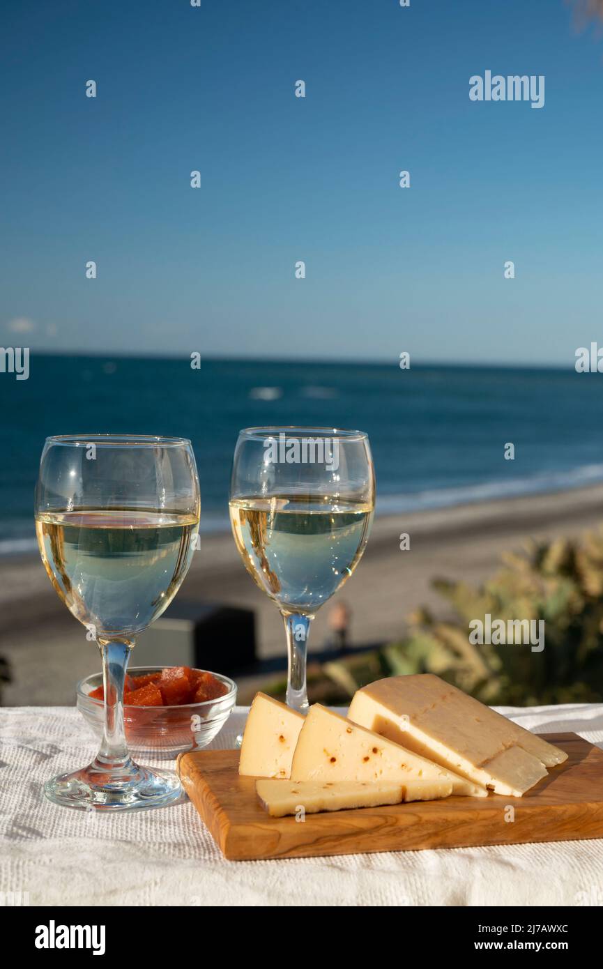 Spanish hard Andalusian cheese filled with sweet sherry served outdoor ...