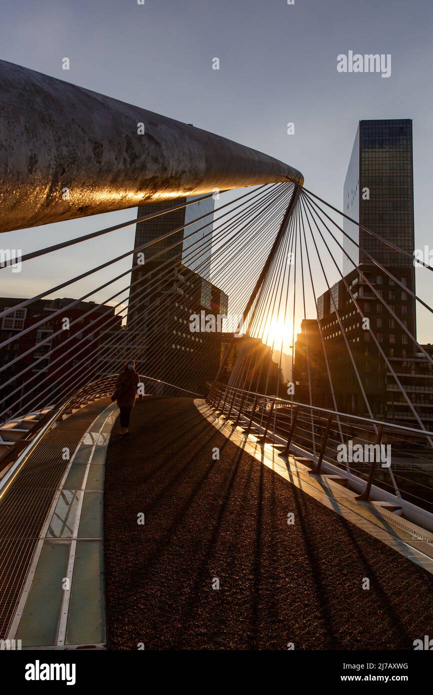 Zubizuri Bridge and Isozaki Towers at sunset, Bilbao, Spain Stock Photo ...